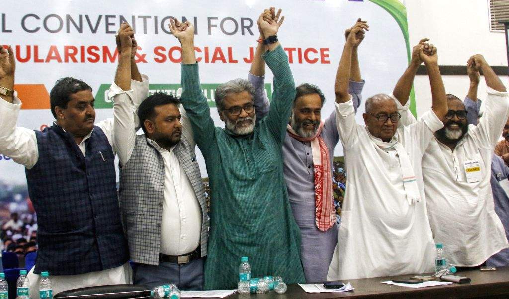 New Delhi : Rajya Sabha MP Digvijaya Singh, activist Yogendra Yadav ...