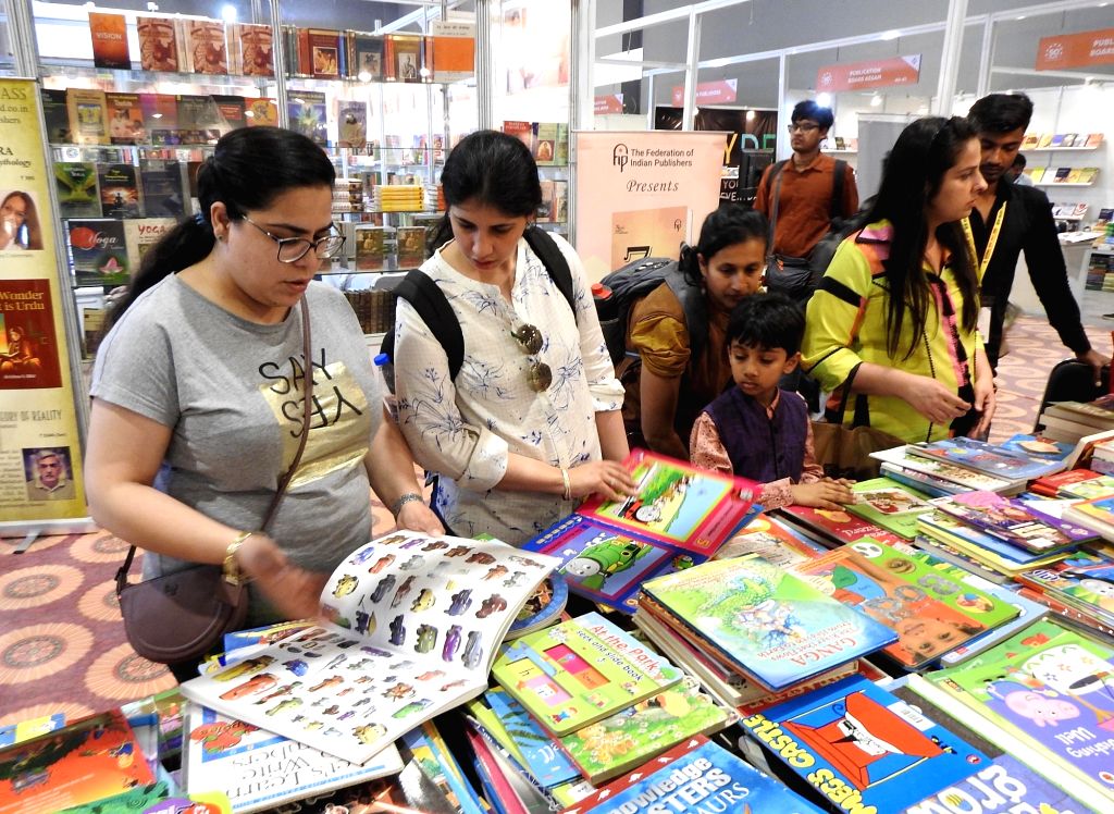 : New Delhi :Visitors admire books on the first day of 31st World Book ...