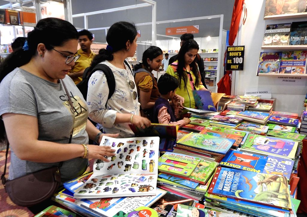 : New Delhi :Visitors admire books on the first day of 31st World Book ...