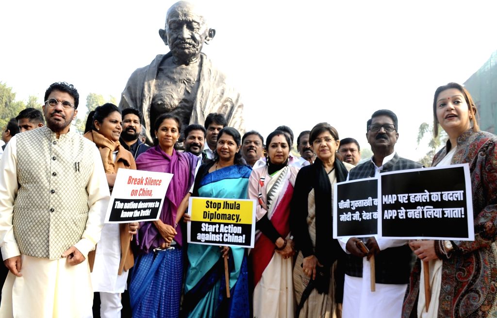 Opposition leaders take part in a protest