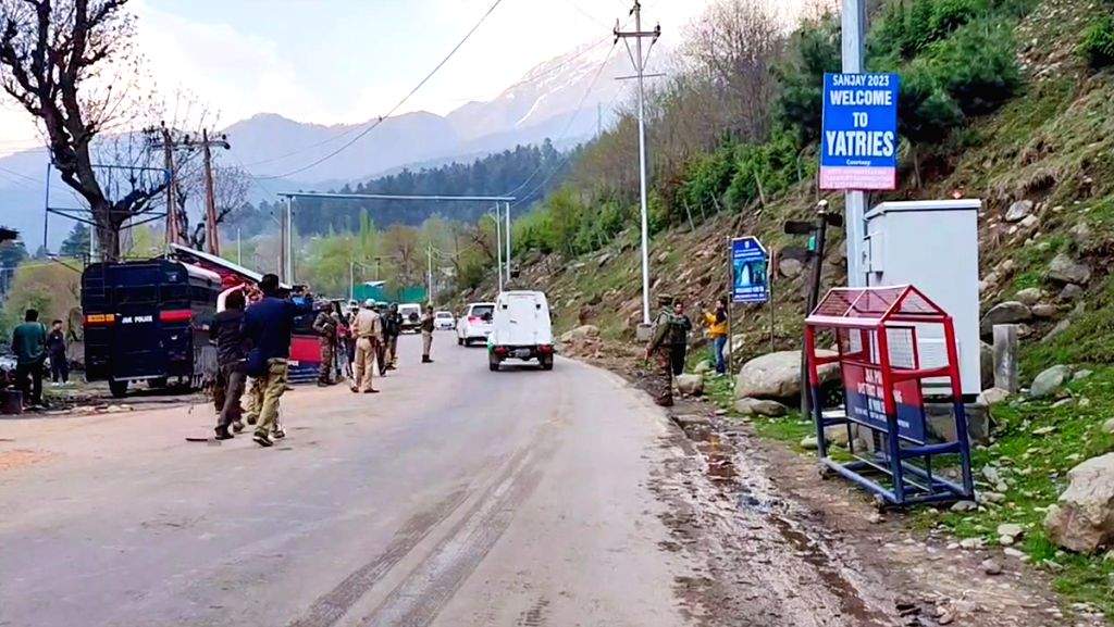 Security personnel rush to the spot following a terrorist attack on ...