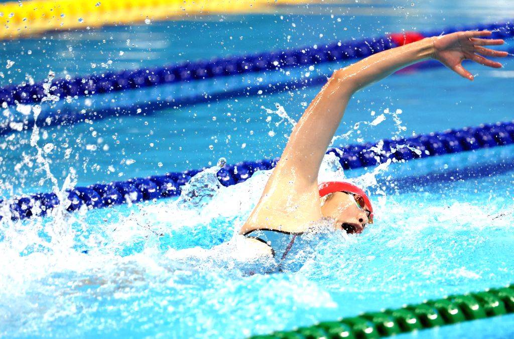 Pak Mi-song of North Korea races in a heat of the women's 100-meter ...