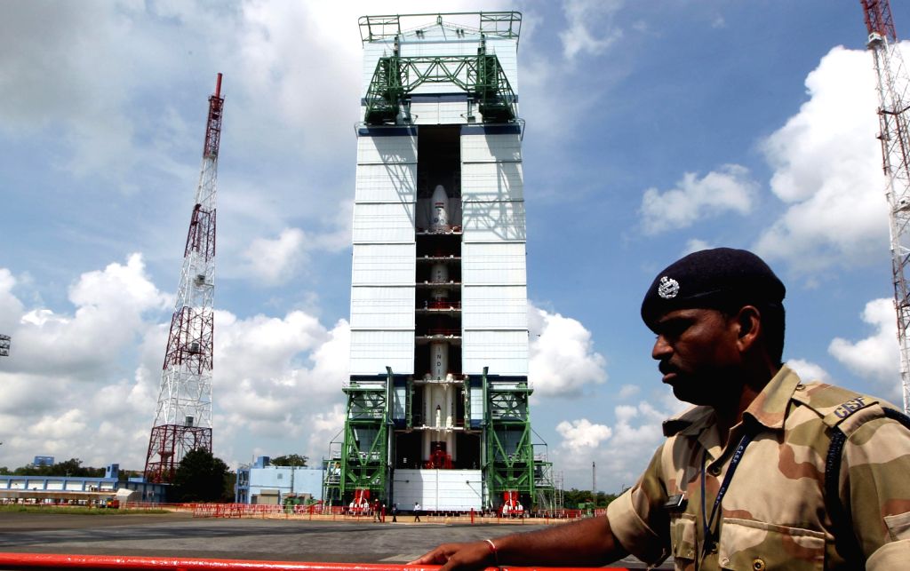Paramilitary soldiers guard Polar Satellite Launch Vehicle (PSLV-C25)