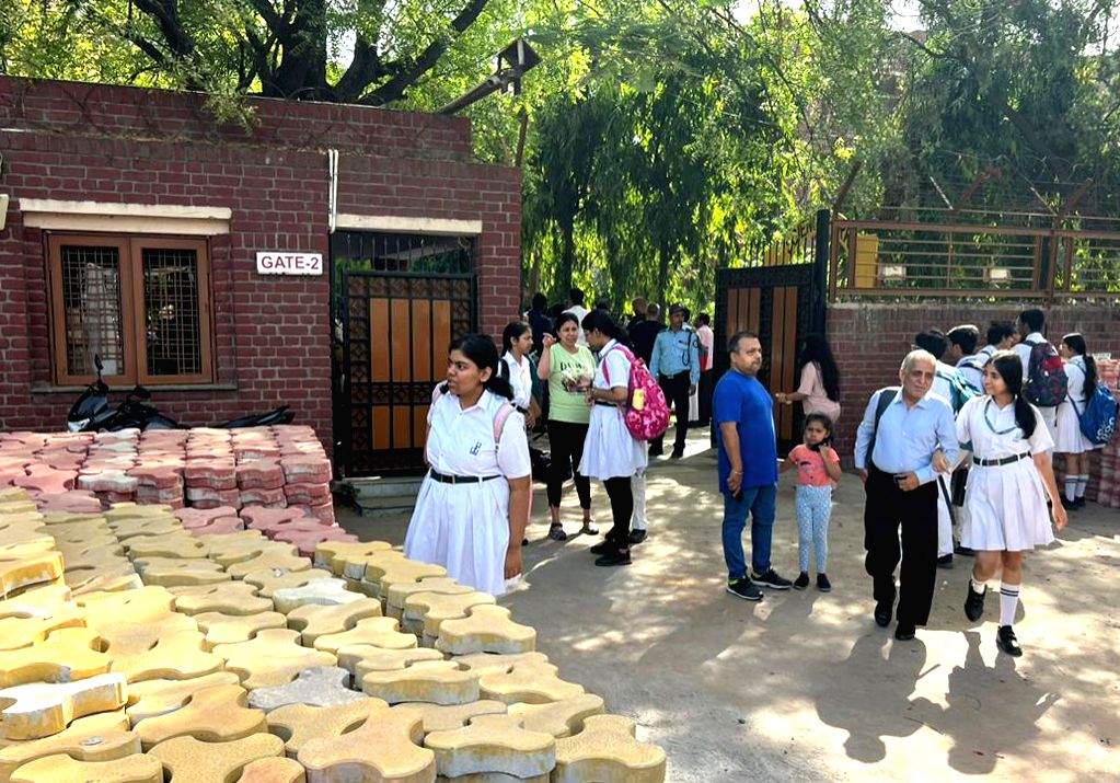 Parents and school children at DPS School, after multiple schools ...