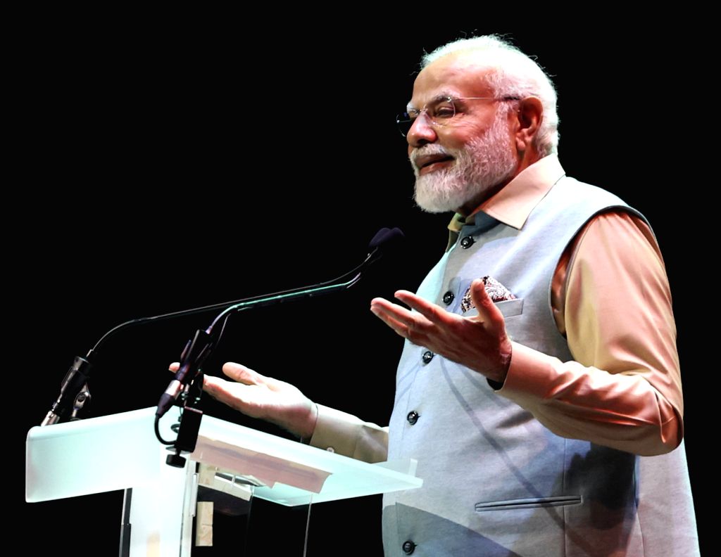 Paris : PM Modi during the community event