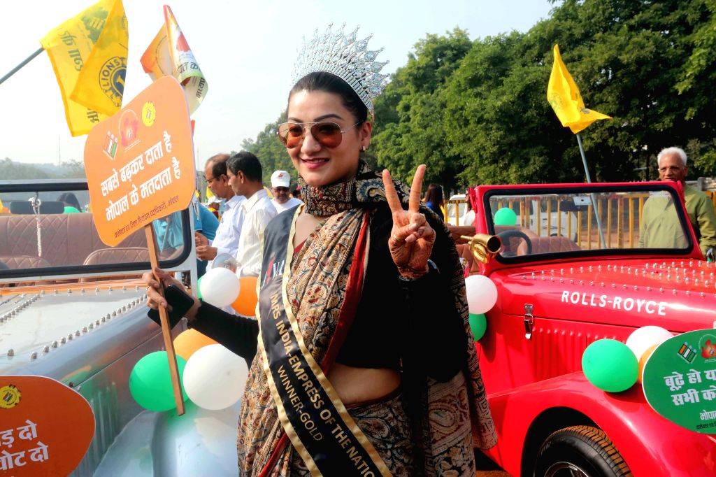 Participants during a voter awareness campaign ahead of the Madhya ...