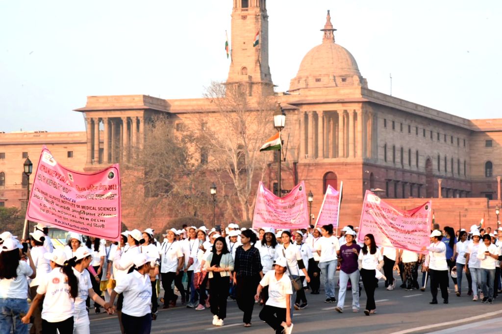 New Delhi: Participants take part in the Mega walkathon event 'Walk for ...