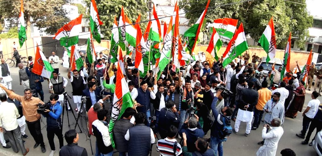 Congress party workers celebrate