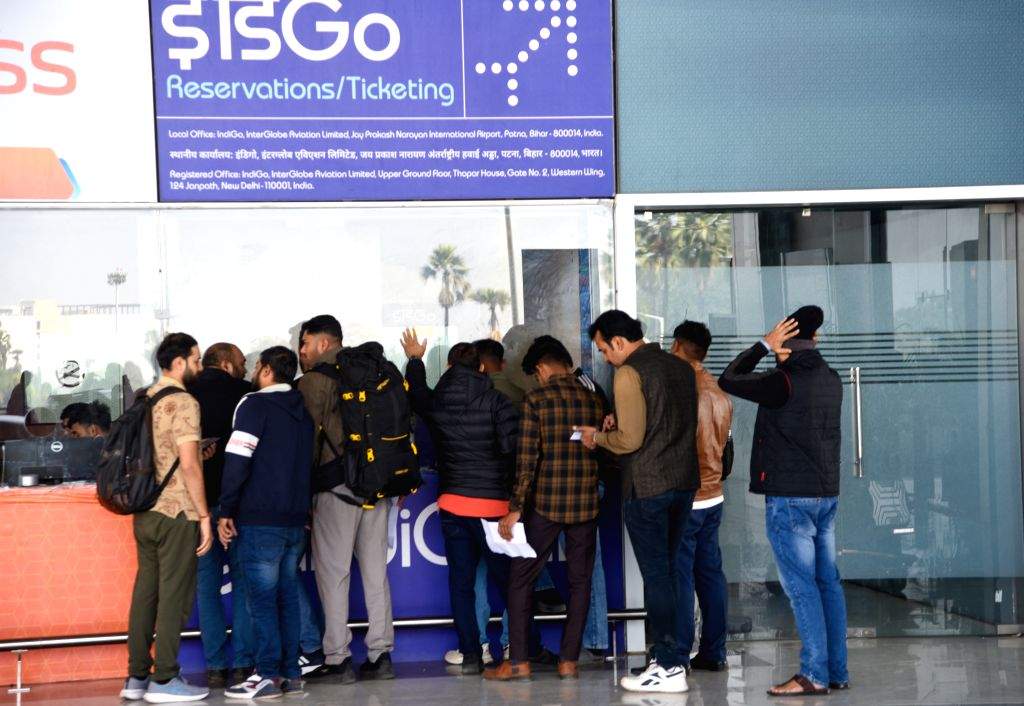 Passengers Gather at IndiGo Counter