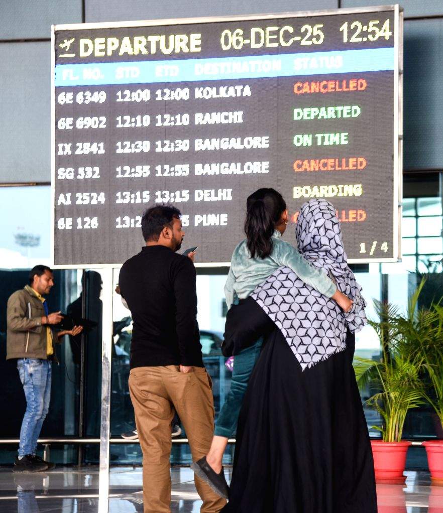 Passengers Gather at IndiGo Counter
