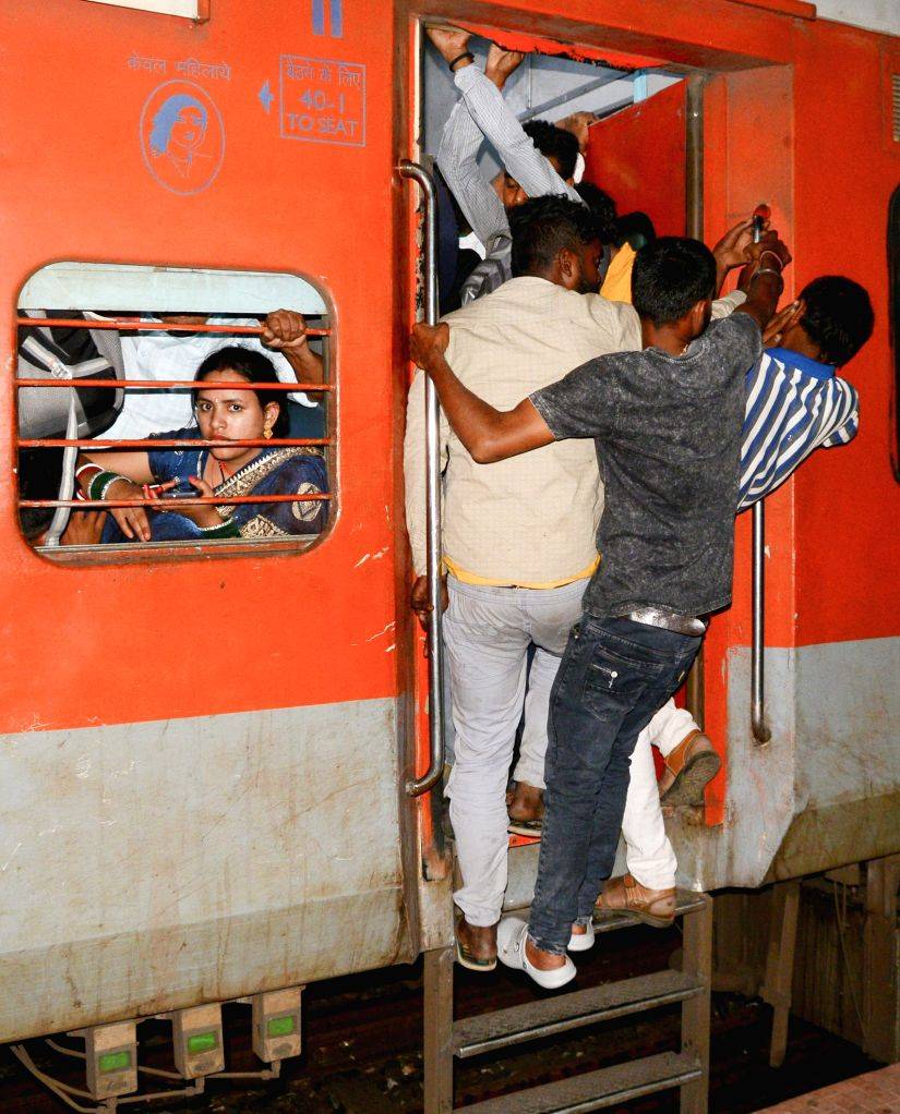 Passengers onboard crowded train for Chhath