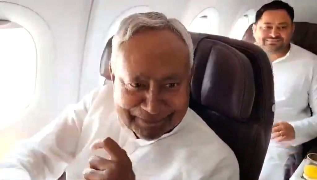 Bihar Chief Minister Nitish Kumar aboard a flight and RJD leader ...