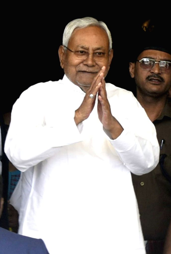 Patna : Bihar CM Nitish Kumar arrives to attend the budget session at ...