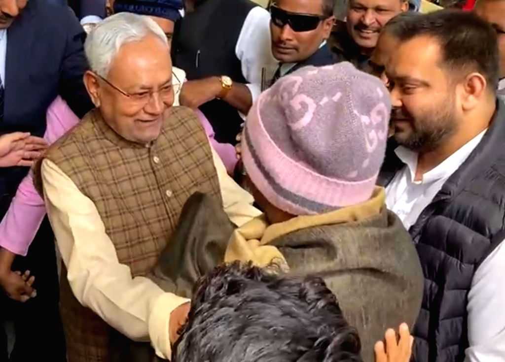 Bihar Chief Minister Nitish Kumar greets RJD leaders Lalu Yadav and ...