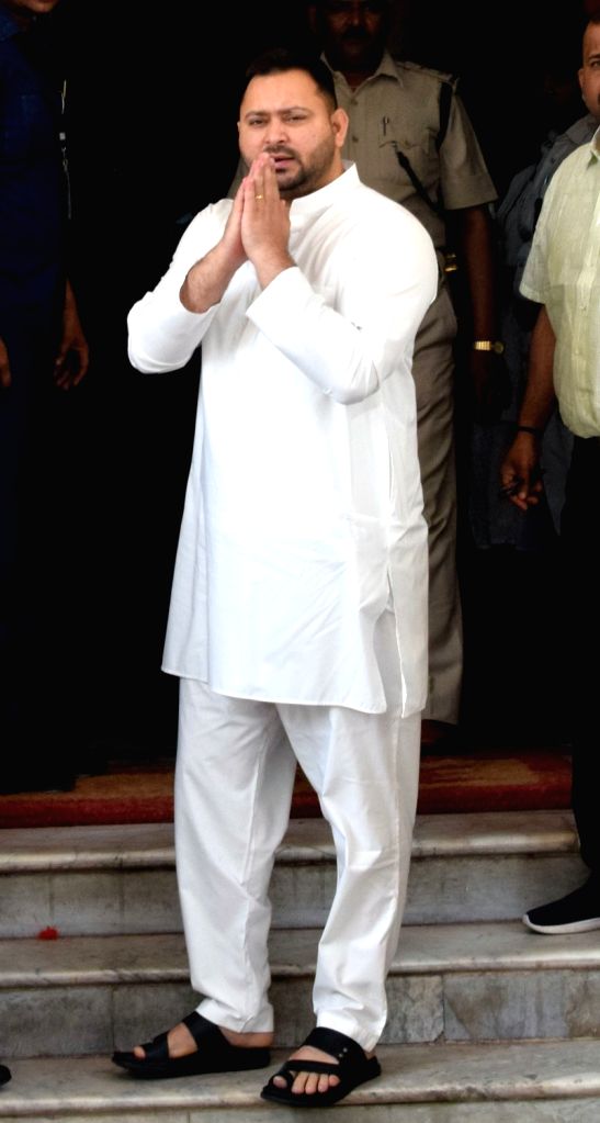 Patna : Bihar Deputy Chief Minister Tejaswi Yadav arrives to attend the ...