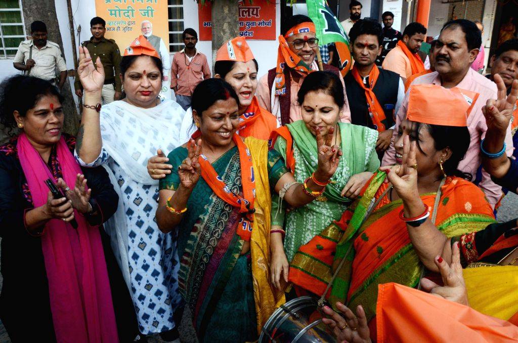 Patna : BJP Workers celebrate their party's lead during counting of ...