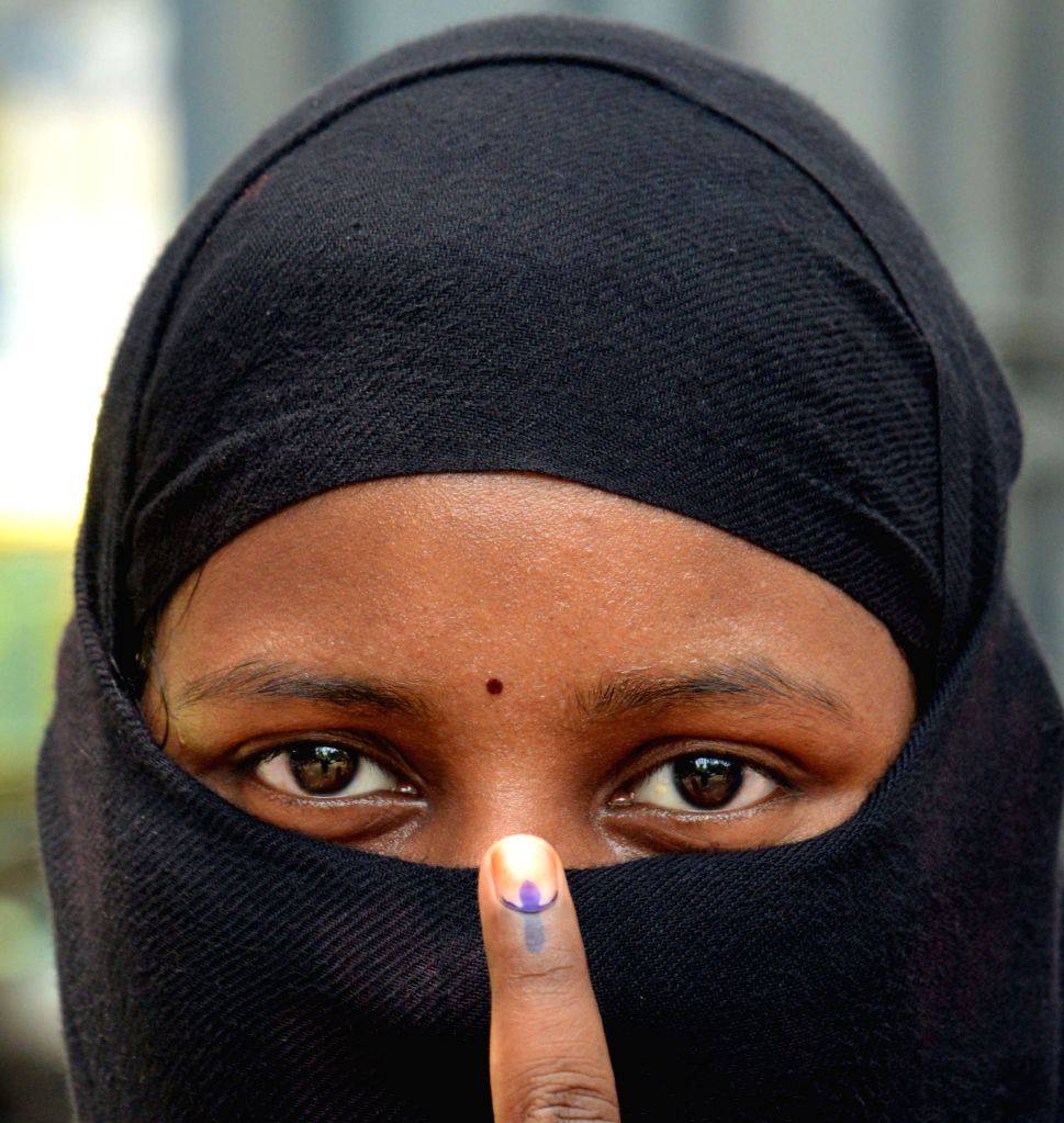 People cast their votes in the seventh and final phase of the Lok Sabha ...
