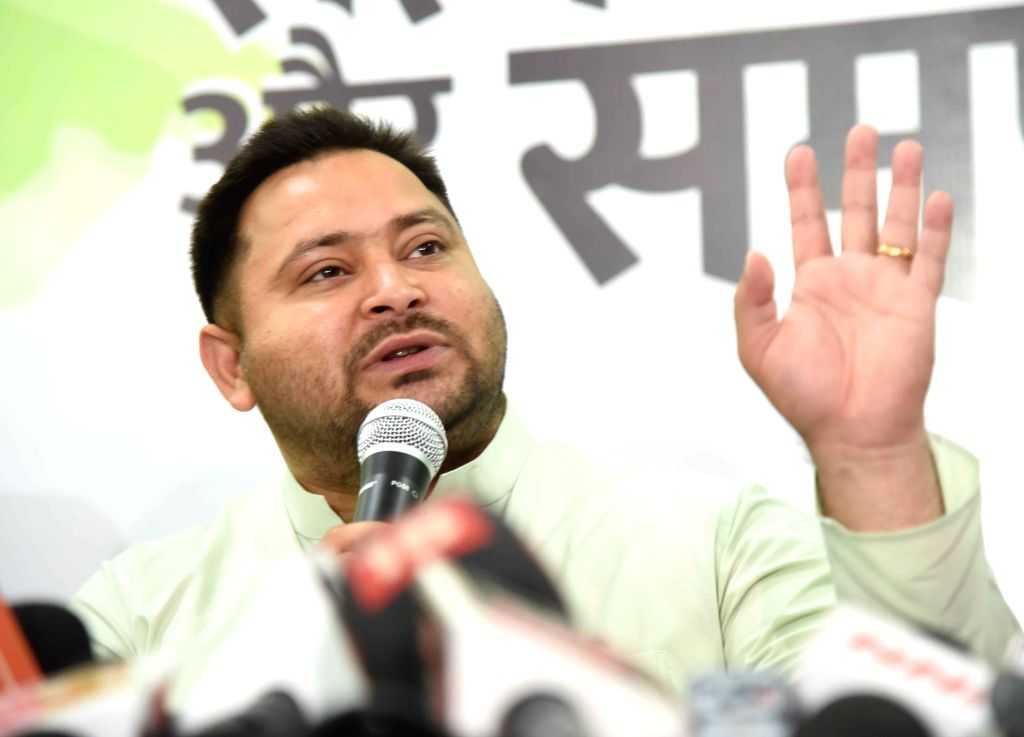 Rashtriya Janta Dal (RJD) leader Tejaswi Yadav addresses a press conference