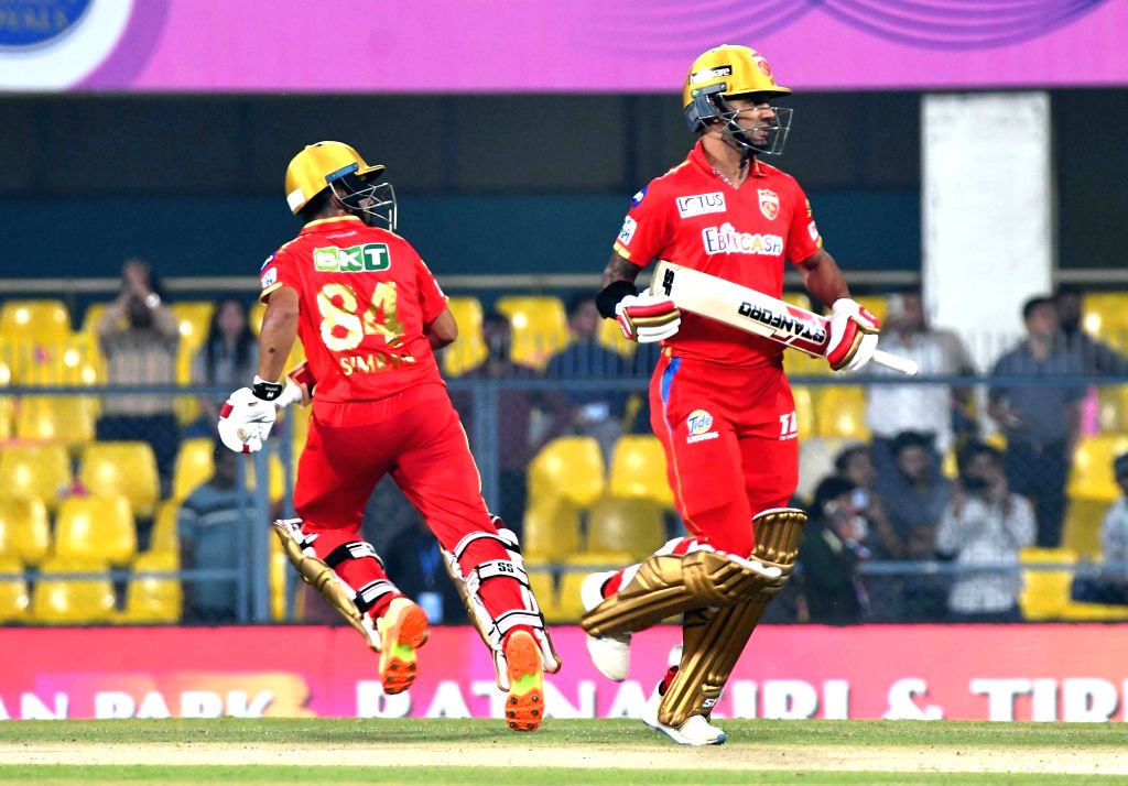 PBKS captain Shikhar Dhawan and batter Prabhsimran Singh run between ...
