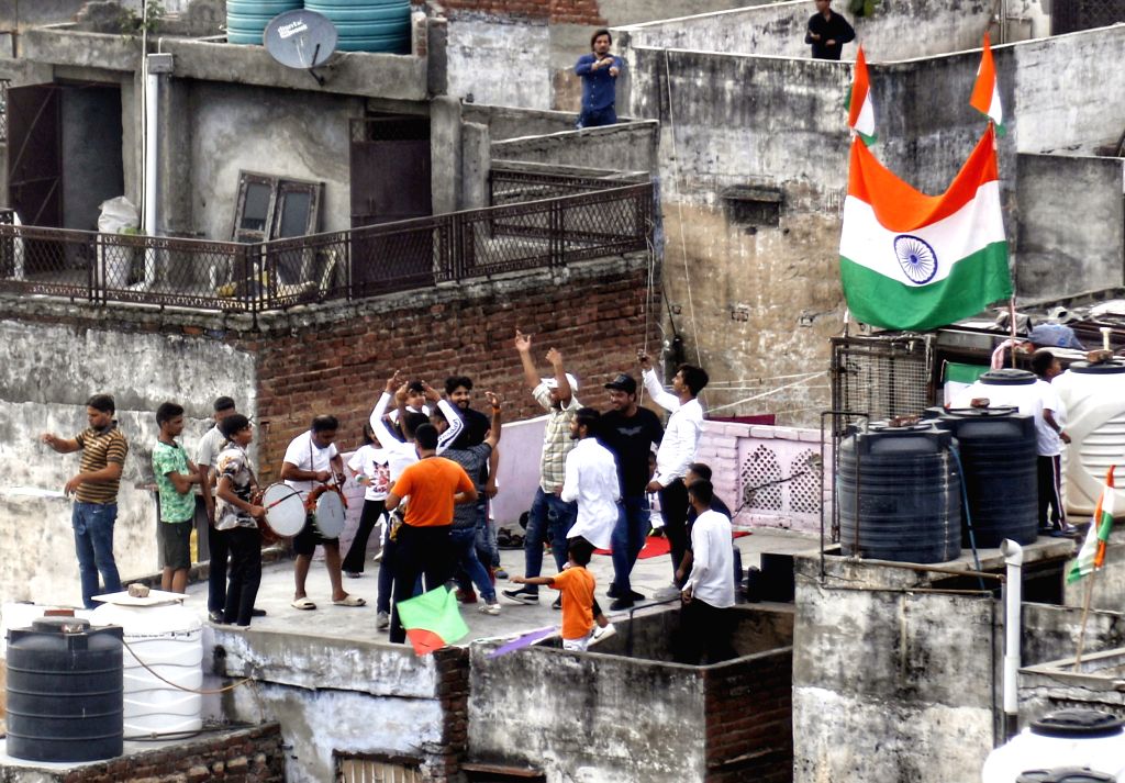 People celebrate during the 77th Independence Day