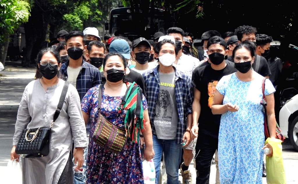 New Delhi : People from Myanmar participate in a rally organised by ...