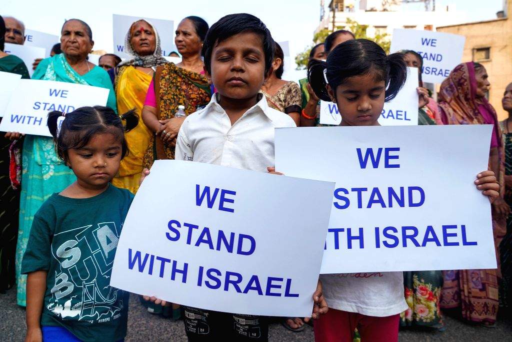 People holds placards in solidarity with Israel