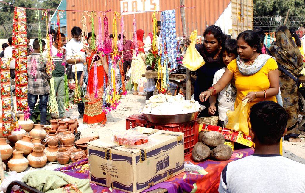 People shop for 'Chhath Puja' celebrations