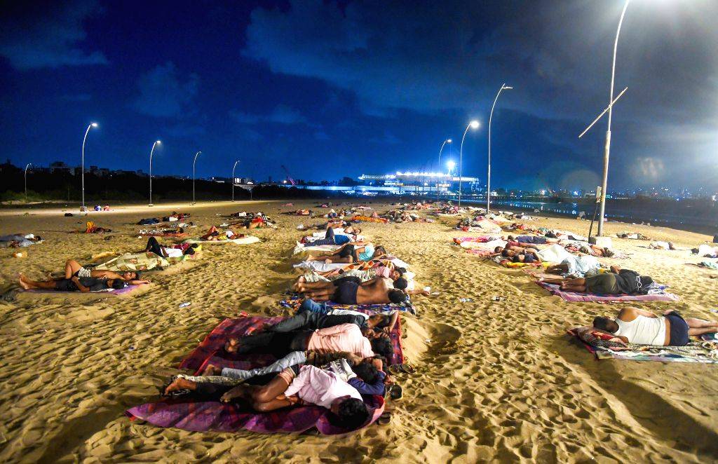 People Sleep on Versova Beach