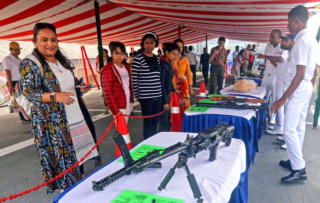 People visit INS Savitri during Navy Day celebrations at Kidderpore Dock