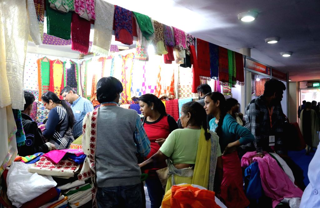 People visit stalls at the India International Trade Fair