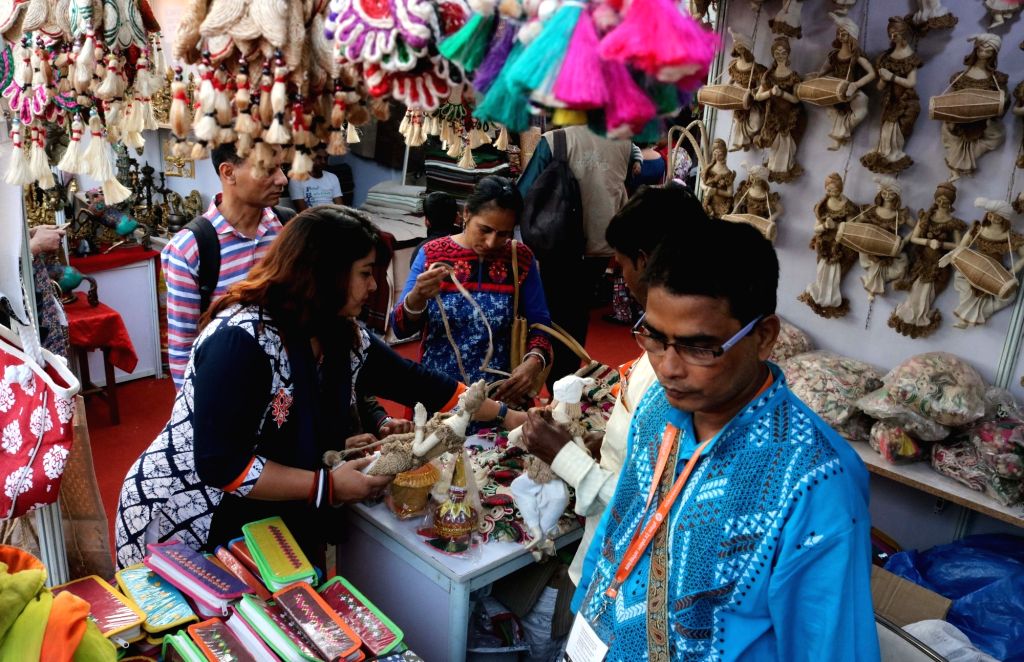 People visit stalls at the India International Trade Fair