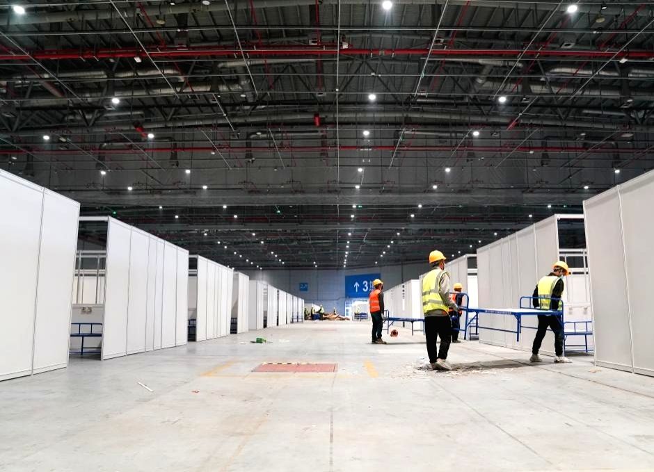 Shanghai :People work at the National Exhibition and Convention Center ...