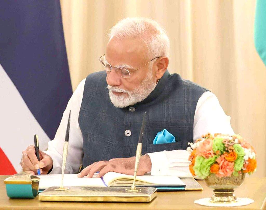 PM Modi signs visitor's book
