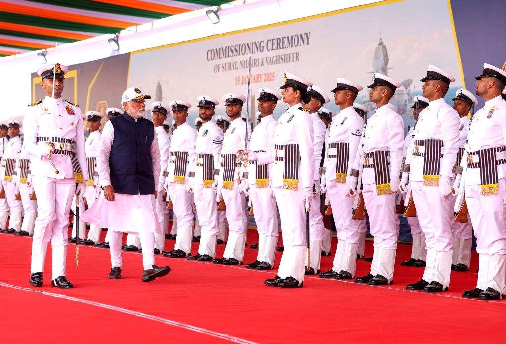 PM Narendra Modi inspects the 'Guard of Honour' at the Naval Dockyard