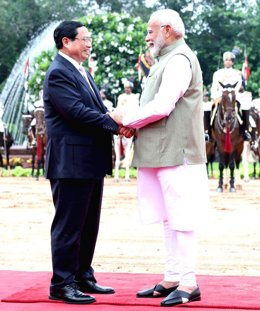 PM Narendra Modi with Vietnamese PM Pham Minh Chinh during the ...