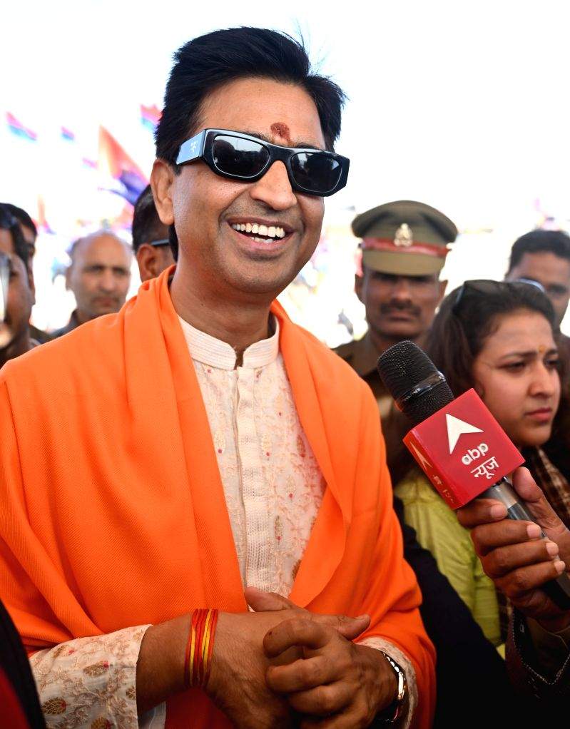 Poet Kumar Vishwas speaks to the media upon his arrival at the Maha ...