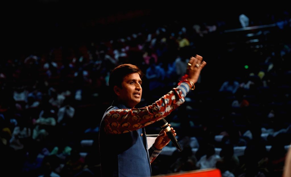 poet, politician and a lecturer DR. Kumar Vishwas addresses a function ...