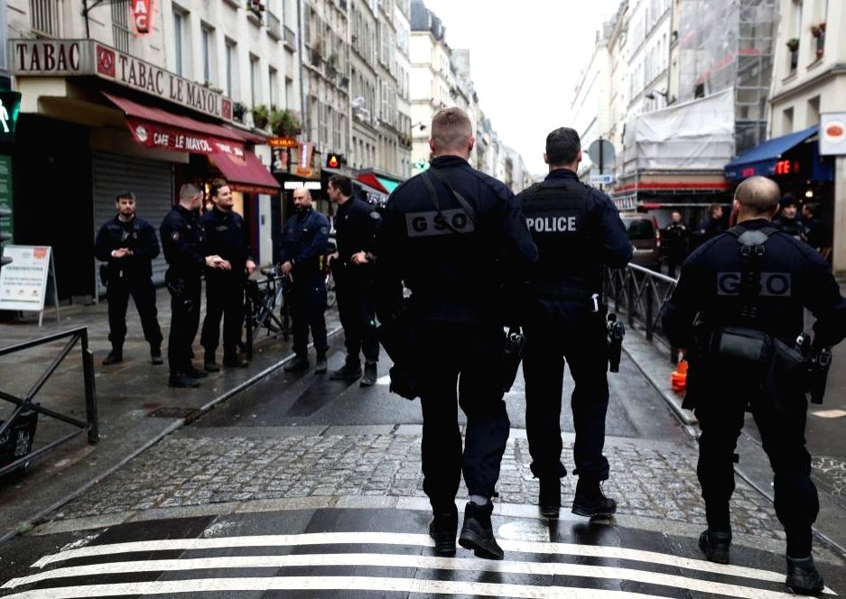 Paris :Police officers are seen at the scene where a shooting took ...