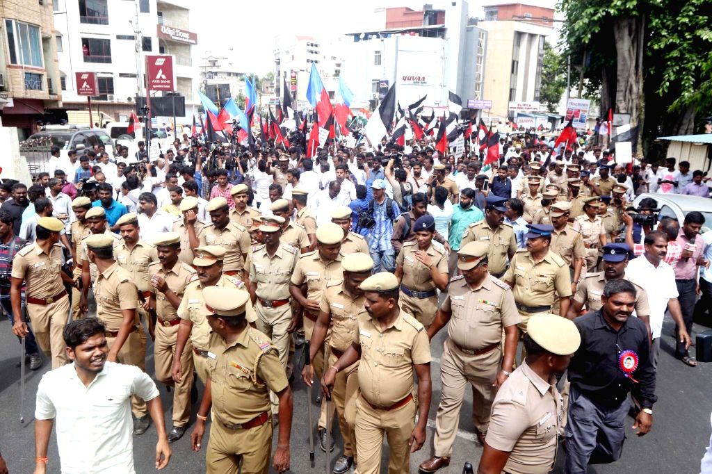 DMK MP Kanimozhi detained with party workers during a protest rally