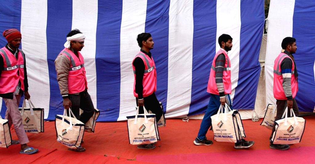Polling Officials Collect Election Materials