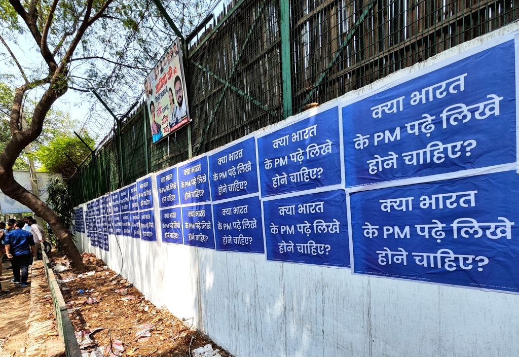 Posters quoted 'Should PM of India be literate' put up on a wall