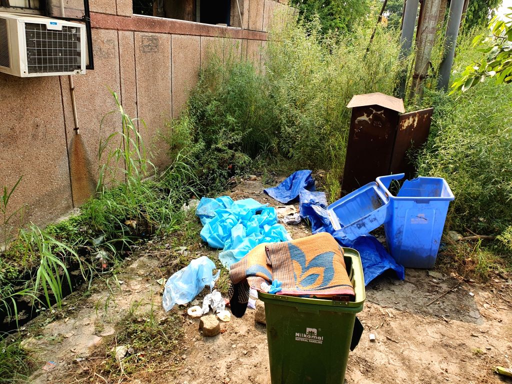 Free Photo: Noida: PPE kit thrown outside postmortem house