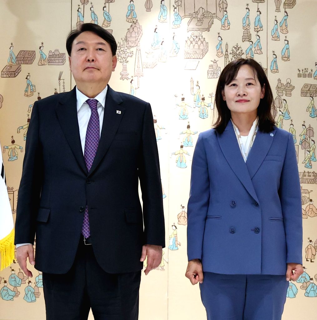 : Seoul: President Yoon Suk Yeol (L) poses for a photo with Jeong Jeong-mi