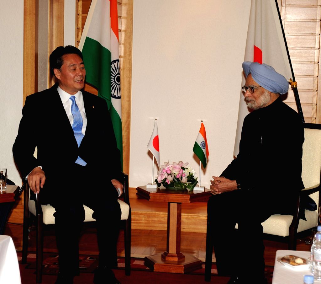 Manmohan Singh at a meeting with Banri Kaieda in Tokyo