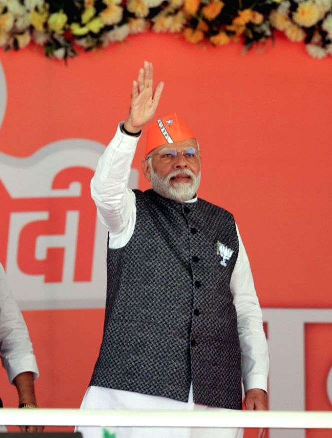 Prime Minister Narendra Modi addresses during a public meeting ahead of ...