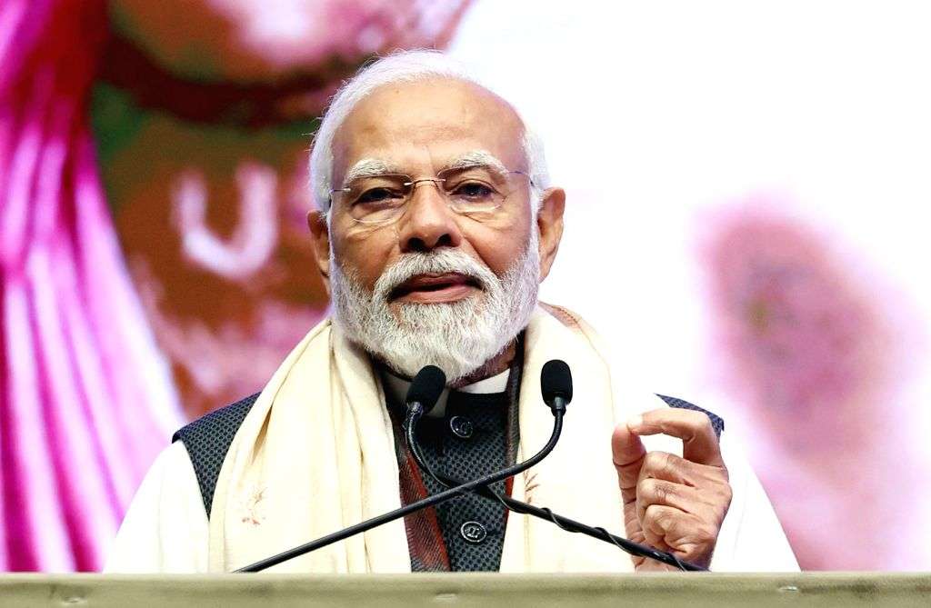 Prime Minister Narendra Modi addresses during a programme marking the ...