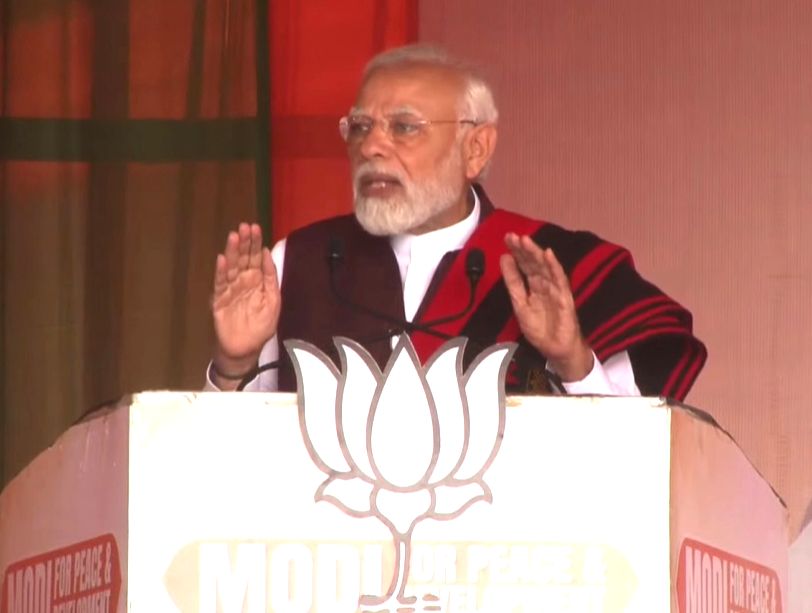 Prime Minister Narendra Modi addresses during the public meeting