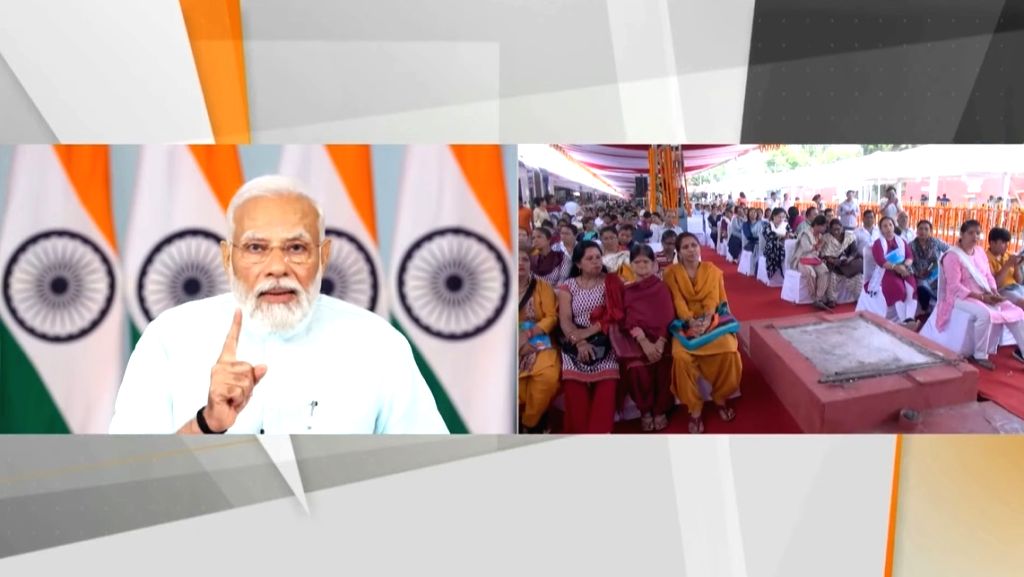 : Prime Minister Narendra Modi addresses during the flag-off ceremony ...