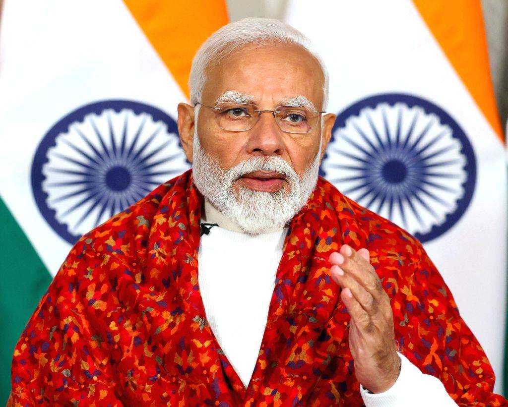 Prime Minister Narendra Modi addresses the launch of a stamp on Ram ...