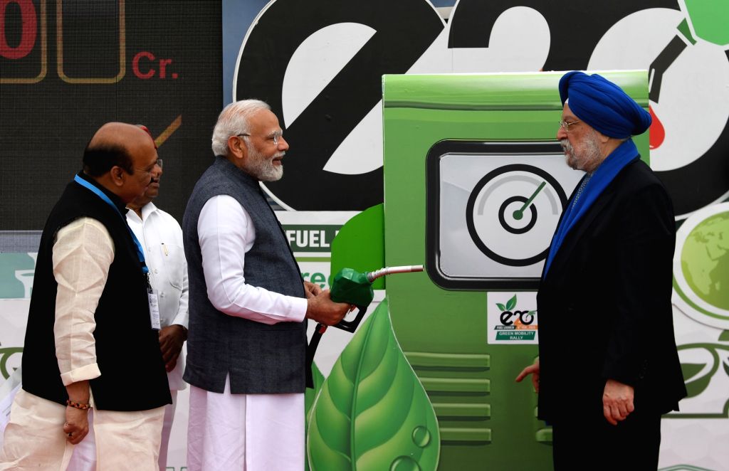 PM Modi along with Union Minister Hardeep Singh Puri launches E20 fuel